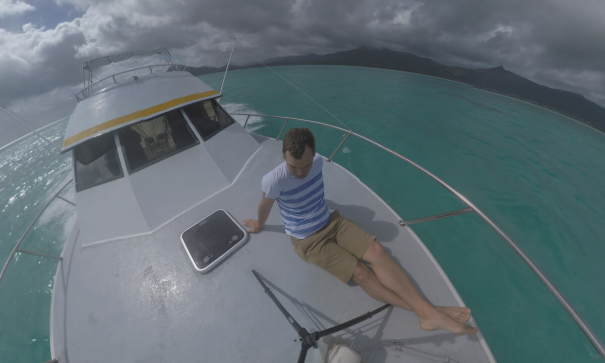 360 VR Man traveling by yacht sailing to Mauritius Island