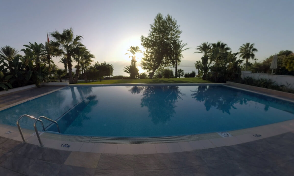 360 VR Resort view with hotel building and outdoor swimming pool, Turkey