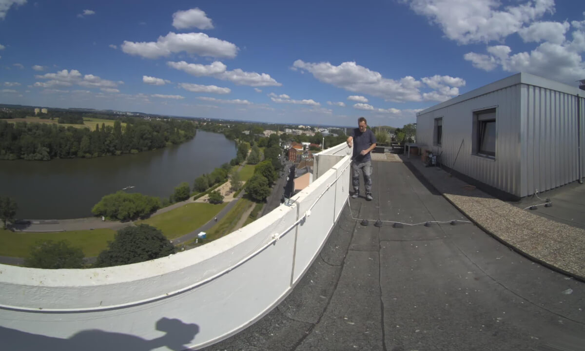 on the roof of a 14-story high-rise building | DeoVR