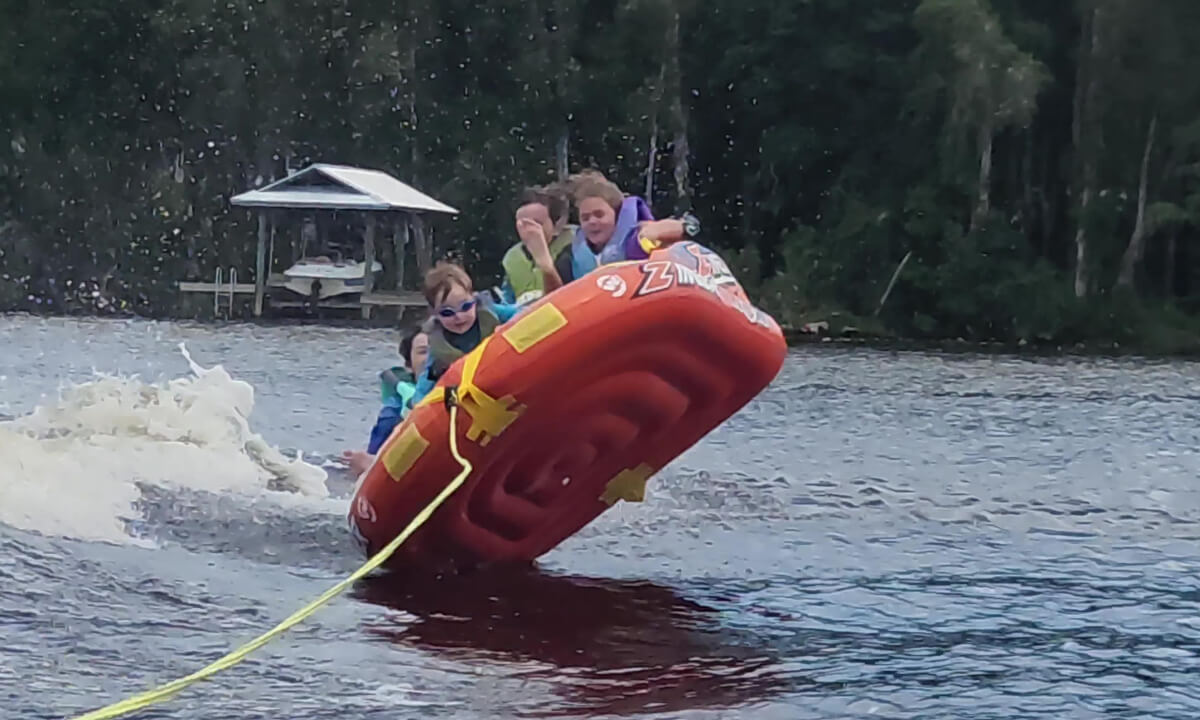 Kids tubing behind the boat and Michael "Air" Jordans got nothing on ...